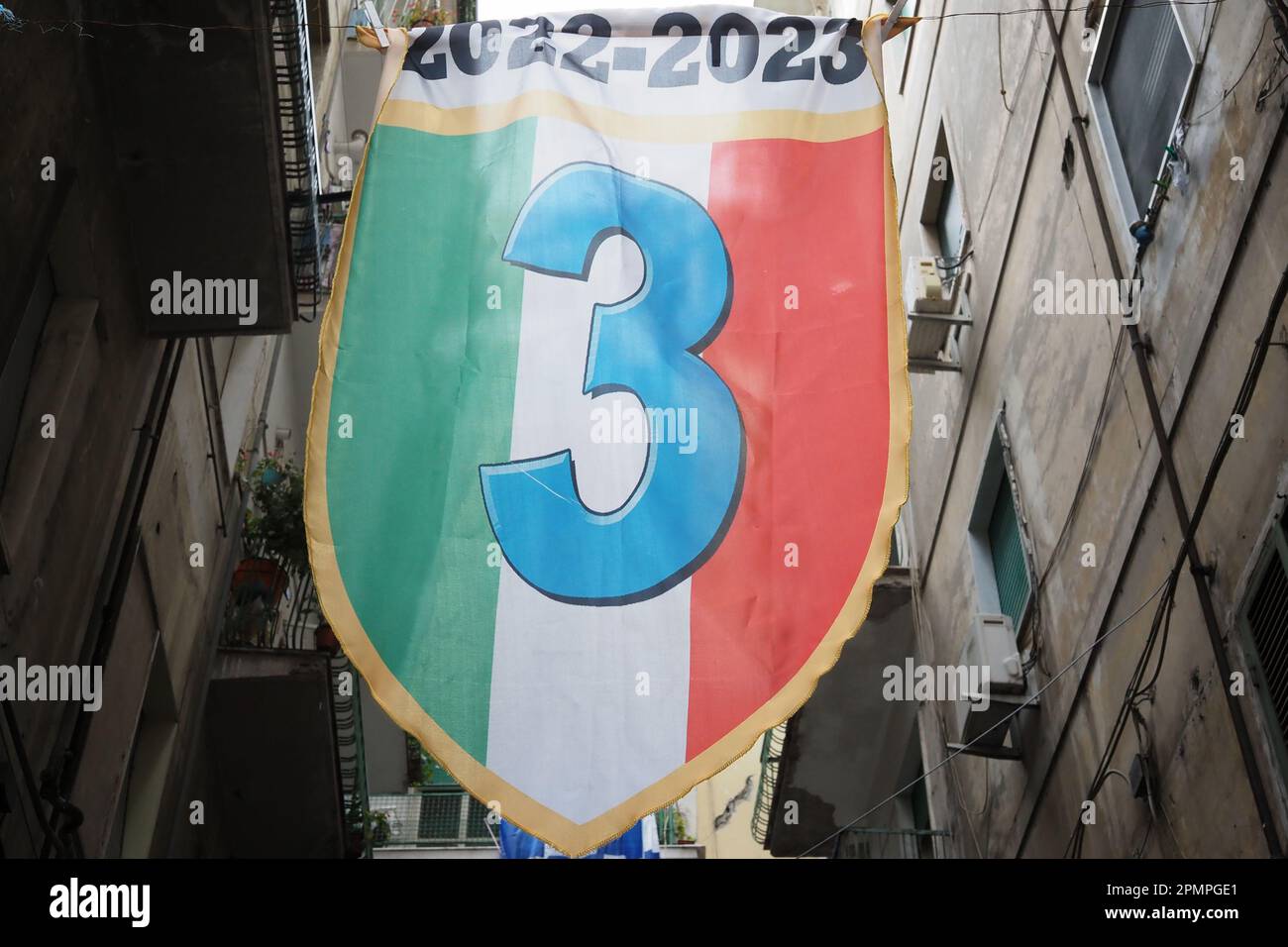 Napoli, Italy. 14th Apr, 2023. Flag depicting the third scudetto of ...
