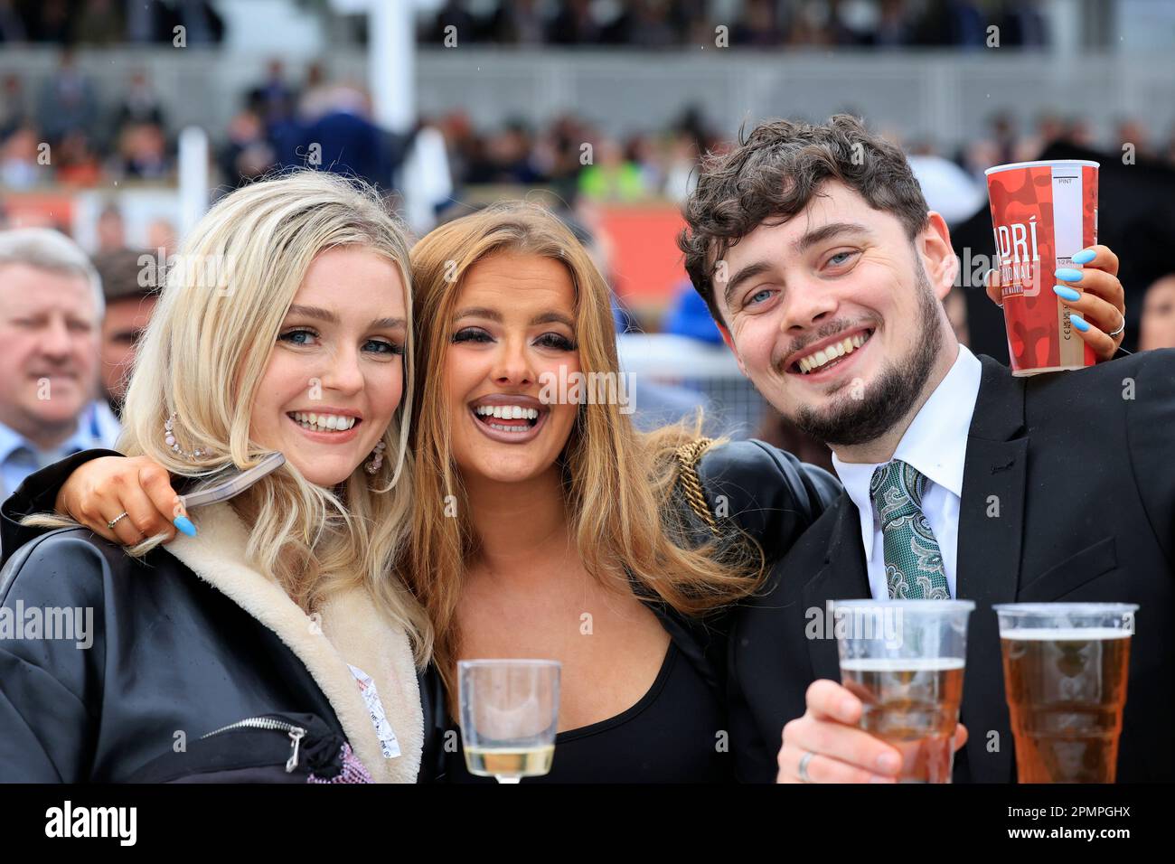 Racegoers enjoying Ladies day at the Randox Grand National festival ...
