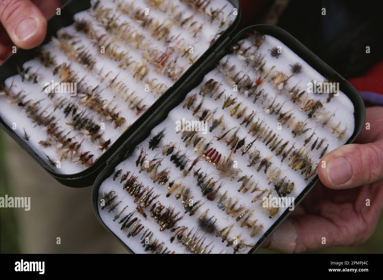 Impressive selection of fishing flies displayed in a small case; Wilson ...