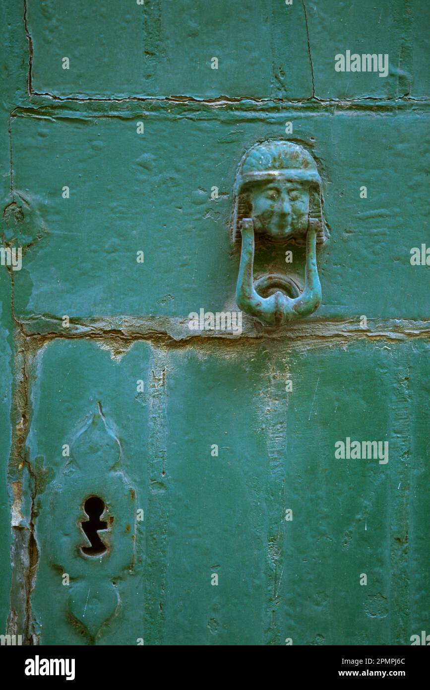 Close view of an old door with knocker and keyhole; Valletta, Malta ...