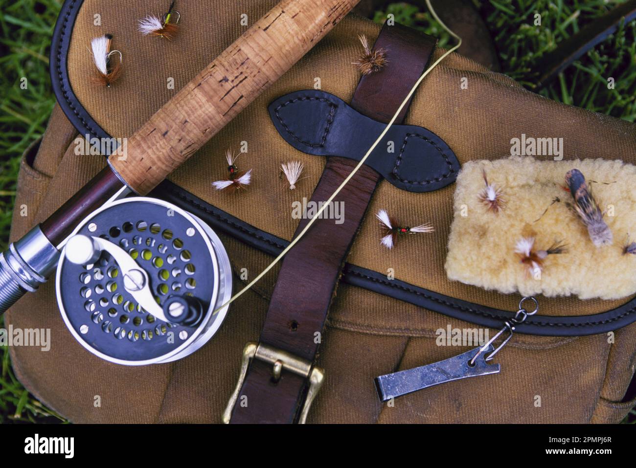 Fishing gear still life with flies, rod & reel, and creel; Wyoming ...