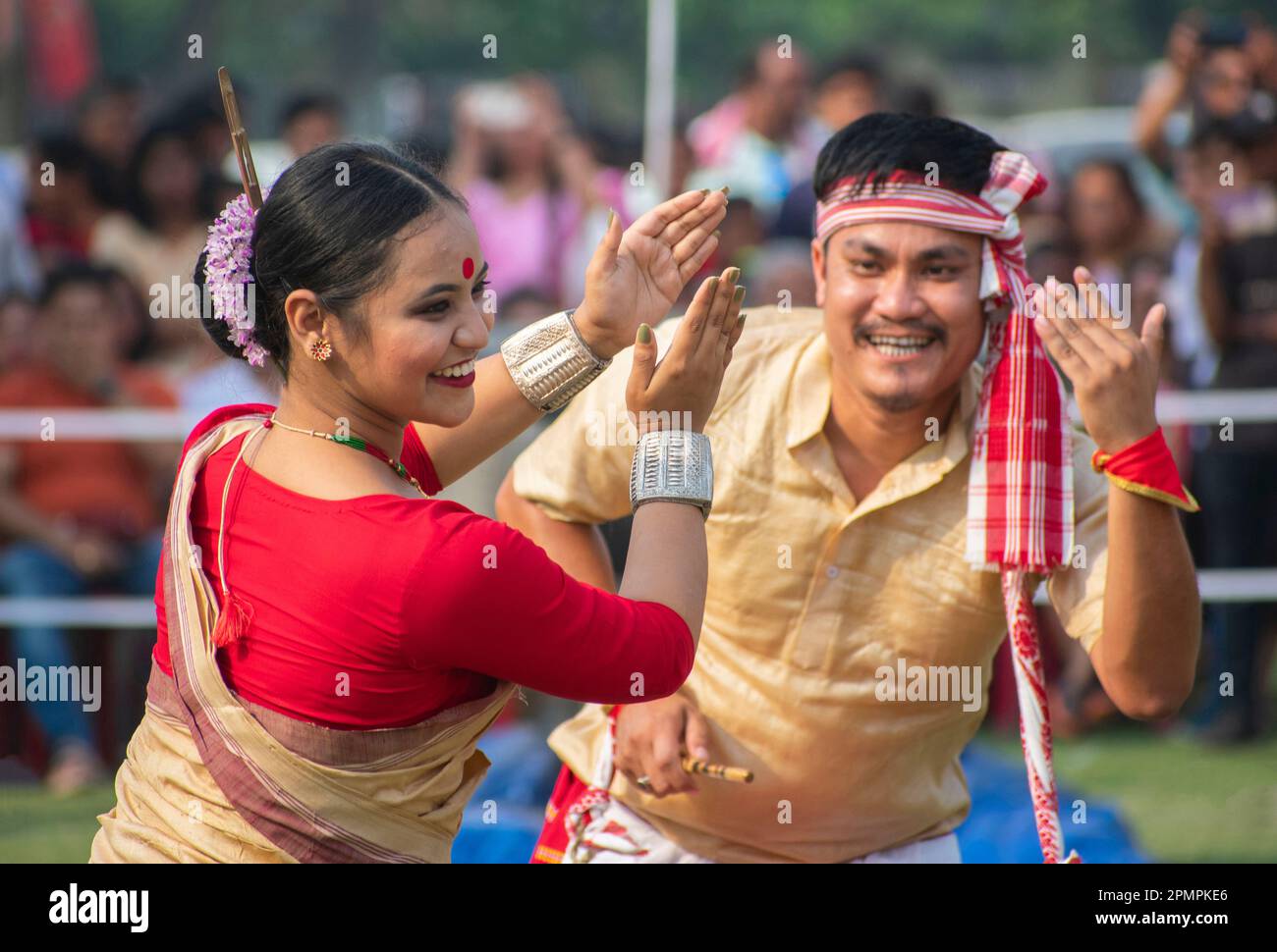 Young men and women in traditional attire perform Bihu dance, as they ...
