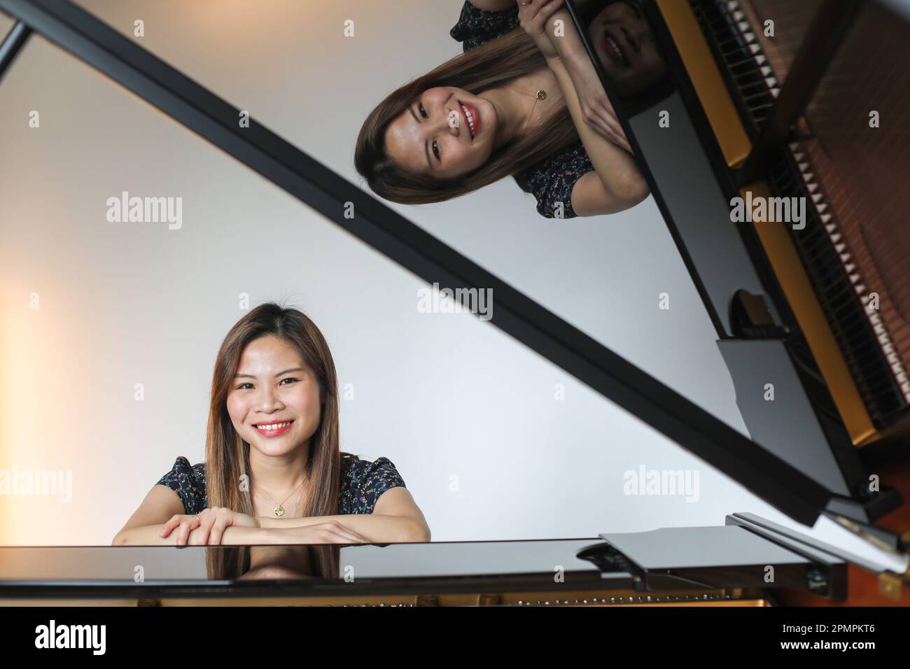 Pianist Rachel Cheung Wai-Ching with her piano in the Mid-Levels. 04APR23 SCMP / Xiaomei Chen ...