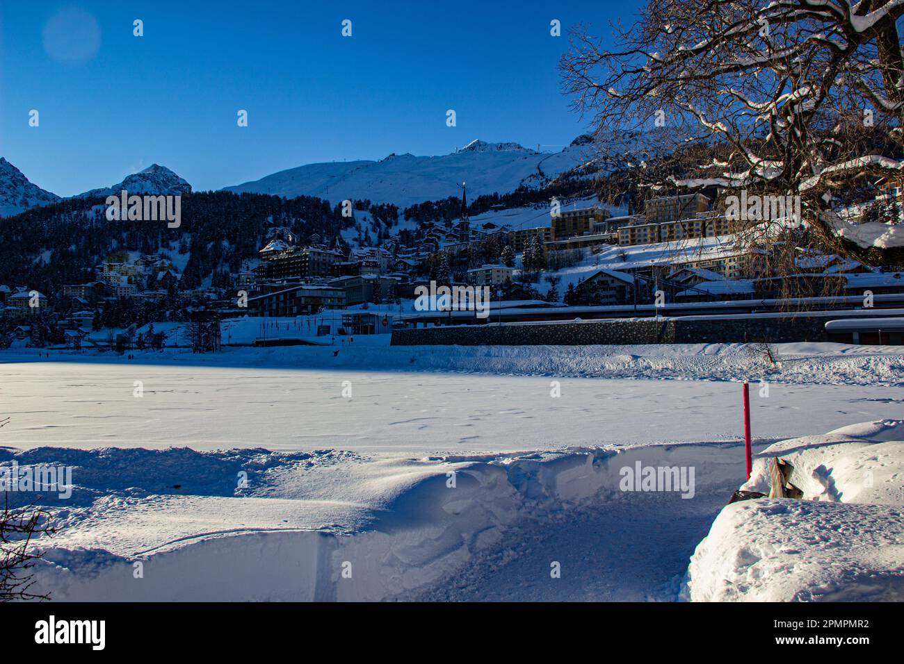 Magnificent sunset in the snowy Swiss Alps overlooking the city of St ...