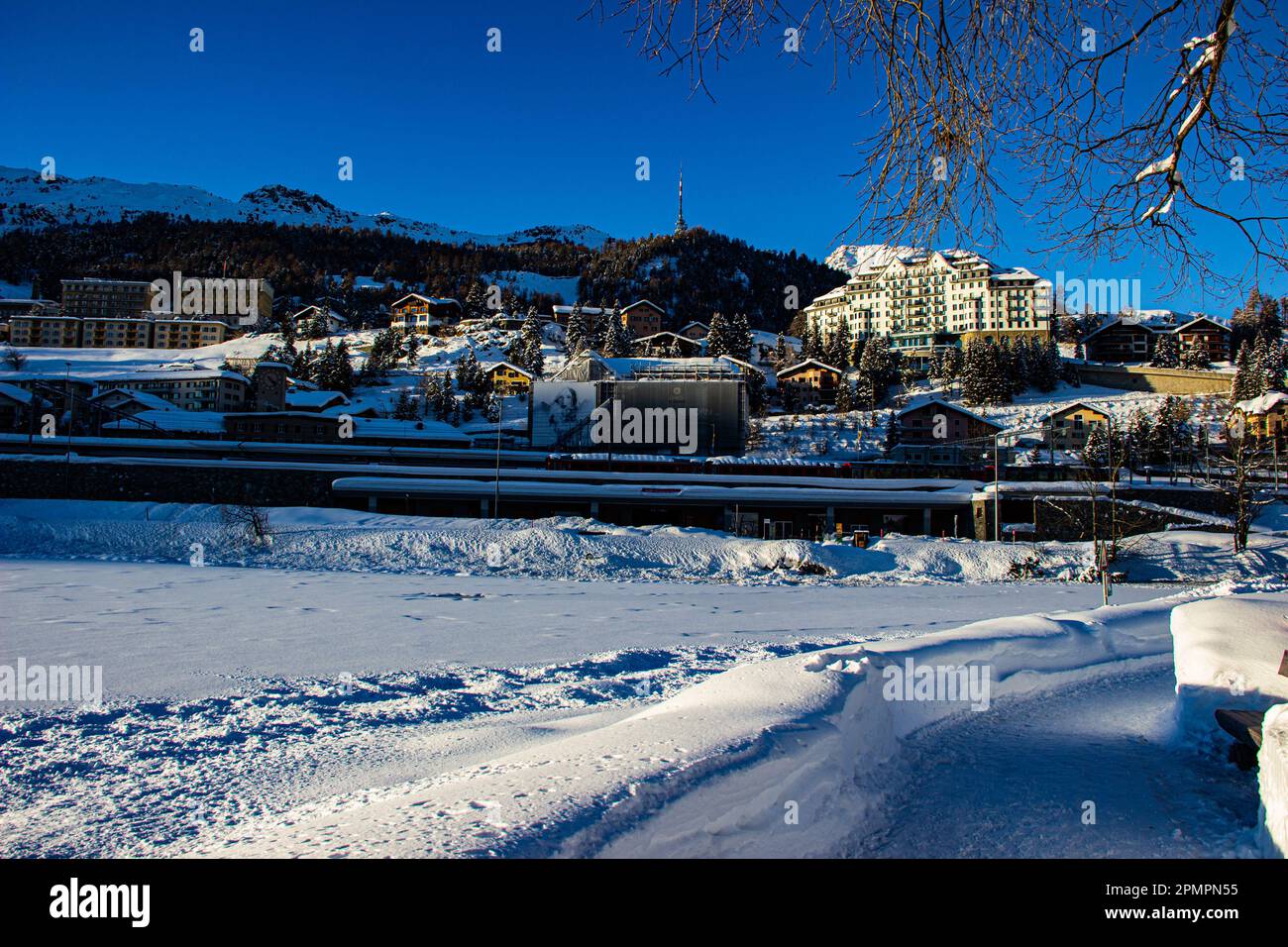 Magnificent sunset in the snowy Swiss Alps overlooking the city of St ...