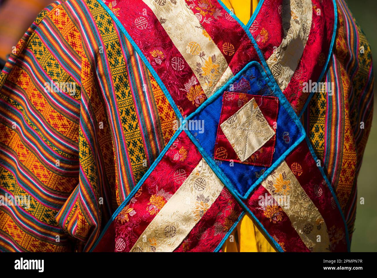 Detail of a traditional robe as seen from the rear; Paro Valley, Bhutan ...