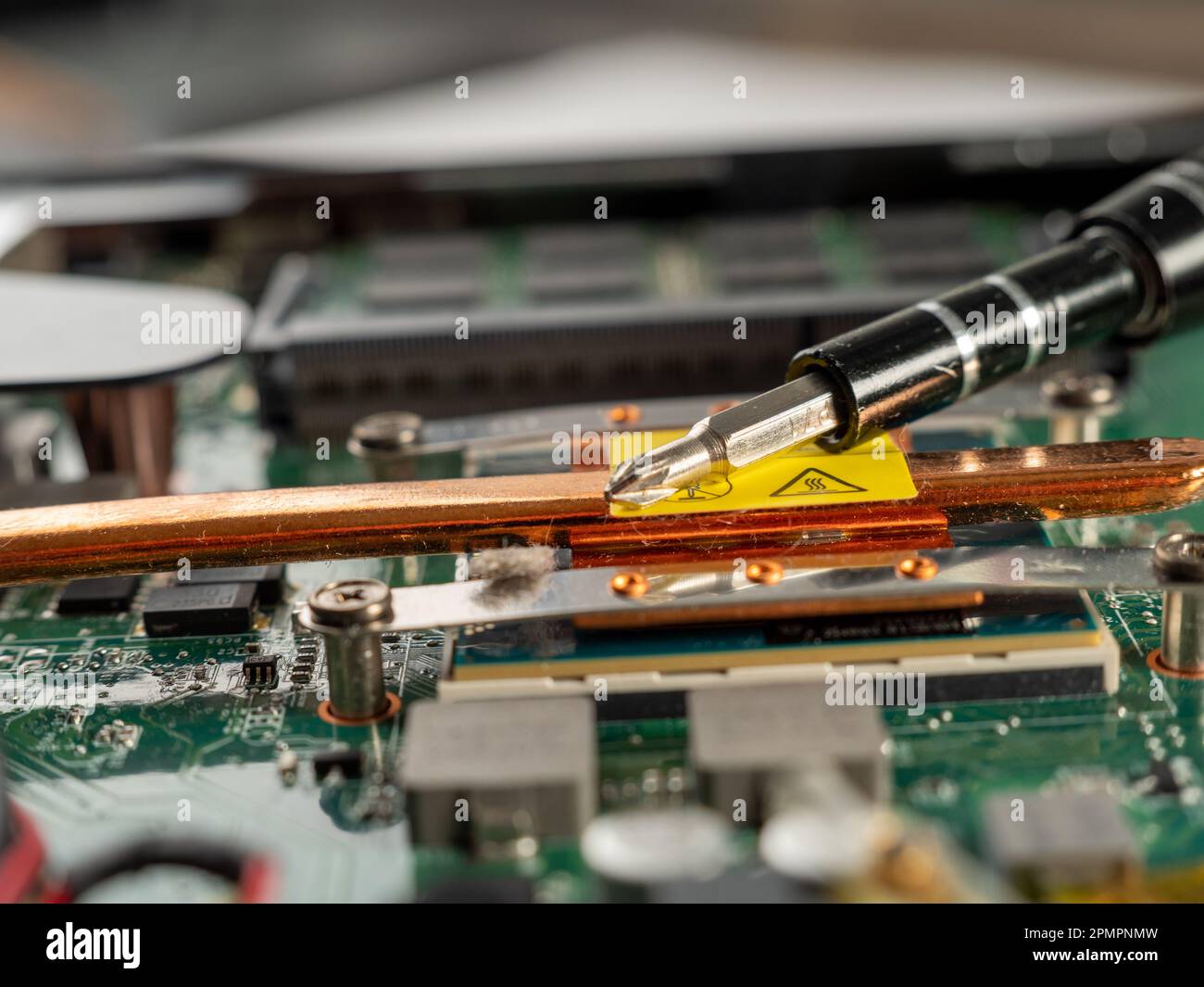 Electronic board of an old broken laptop. Dusty broken laptop under ...