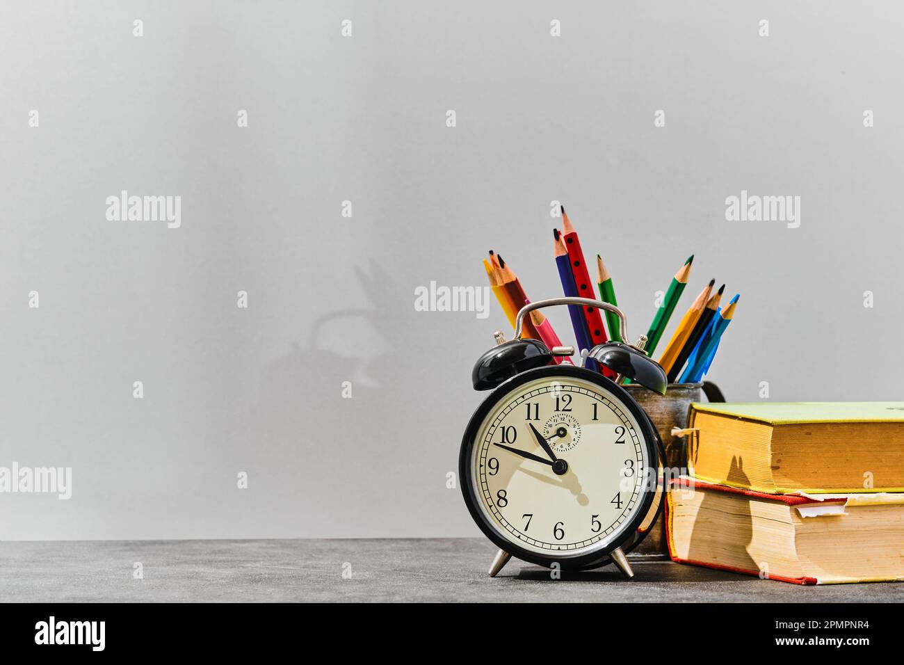 Concept back to school or teacher's day idea. Pens, pencils, books, an ...