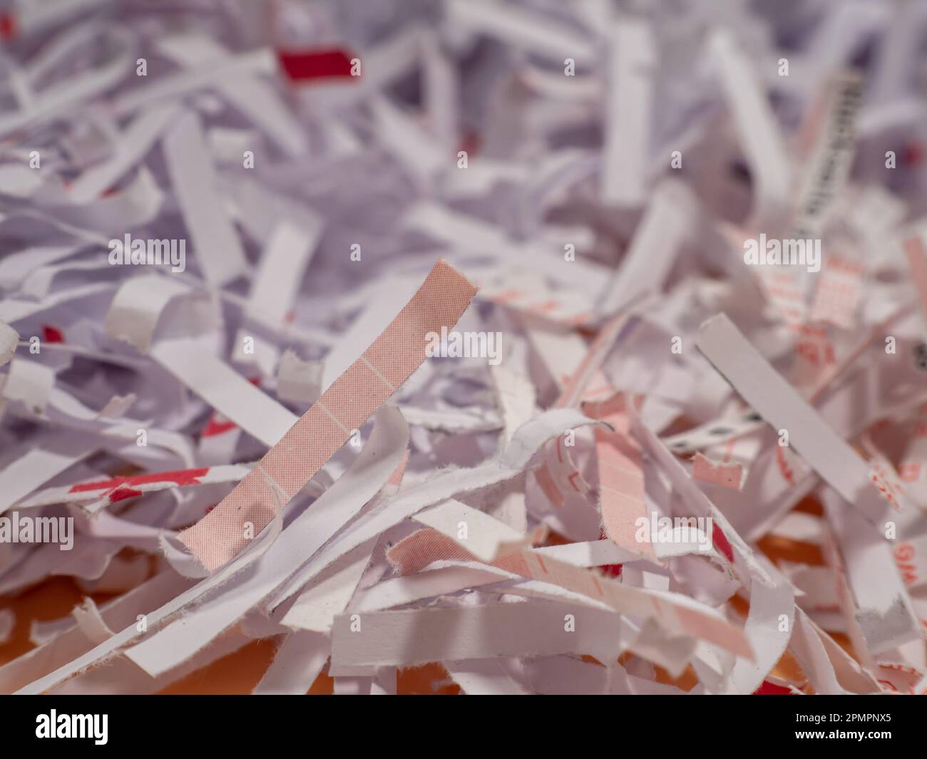 Cut paper. Stationery Document Shredder. Close-up Stock Photo - Alamy