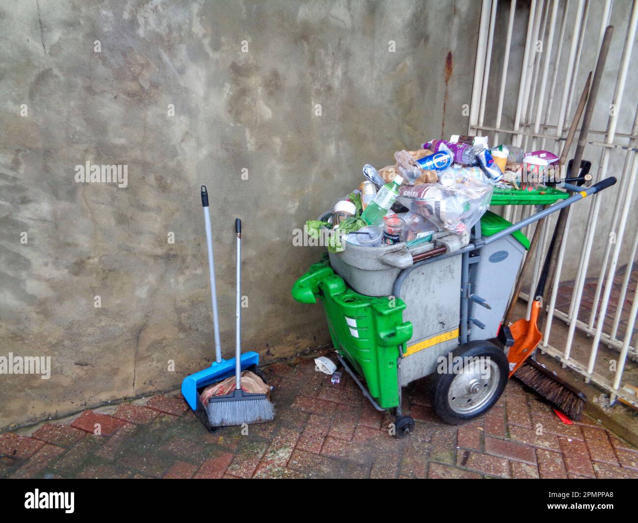 Clean up and waste found still life. Full mobile bins with collected ...