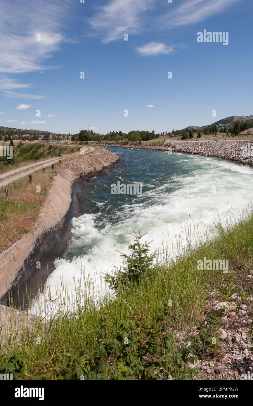 Water diverted from the Sun River churns down Pishkun Canal, Rocky ...