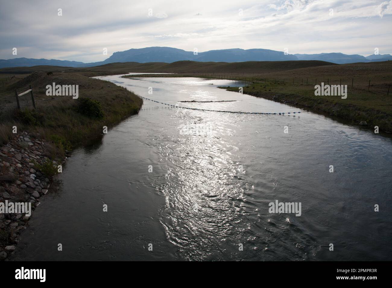 Rocky Mountains and Sun River Canyon in the distance are the origin of ...