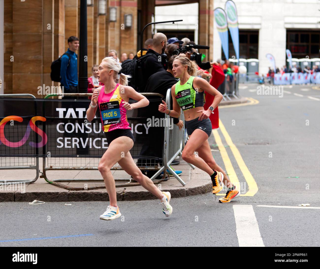 Rose Harvey of Great Britain, passing through Cabot Square, on her way ...