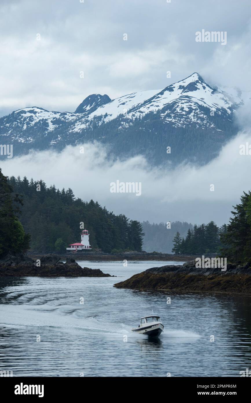 Small motorboat exits Sitka Harbor, Inside Passage, Alaska, USA; Alaska ...