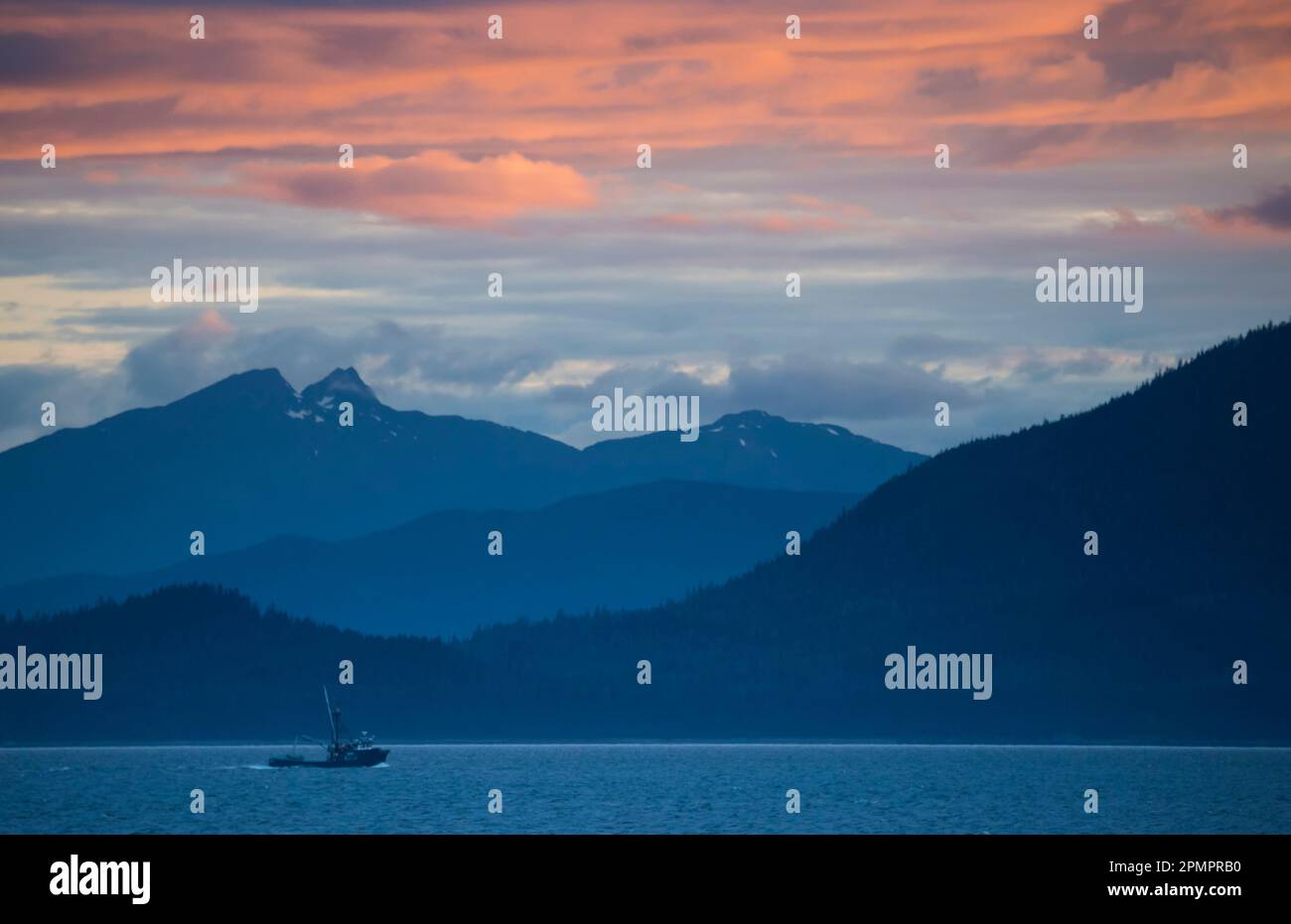 Fishing boat at sunset in Stephens Passage, Alaska, USA; Inside Passage ...