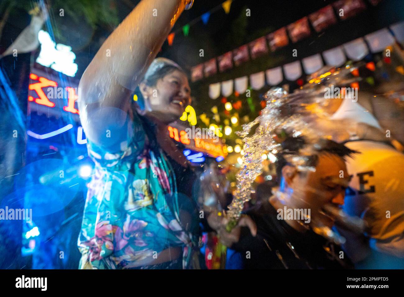 Bangkok, Bangkok, Thailand. 14th Apr, 2023. Nighttime revelers both ...