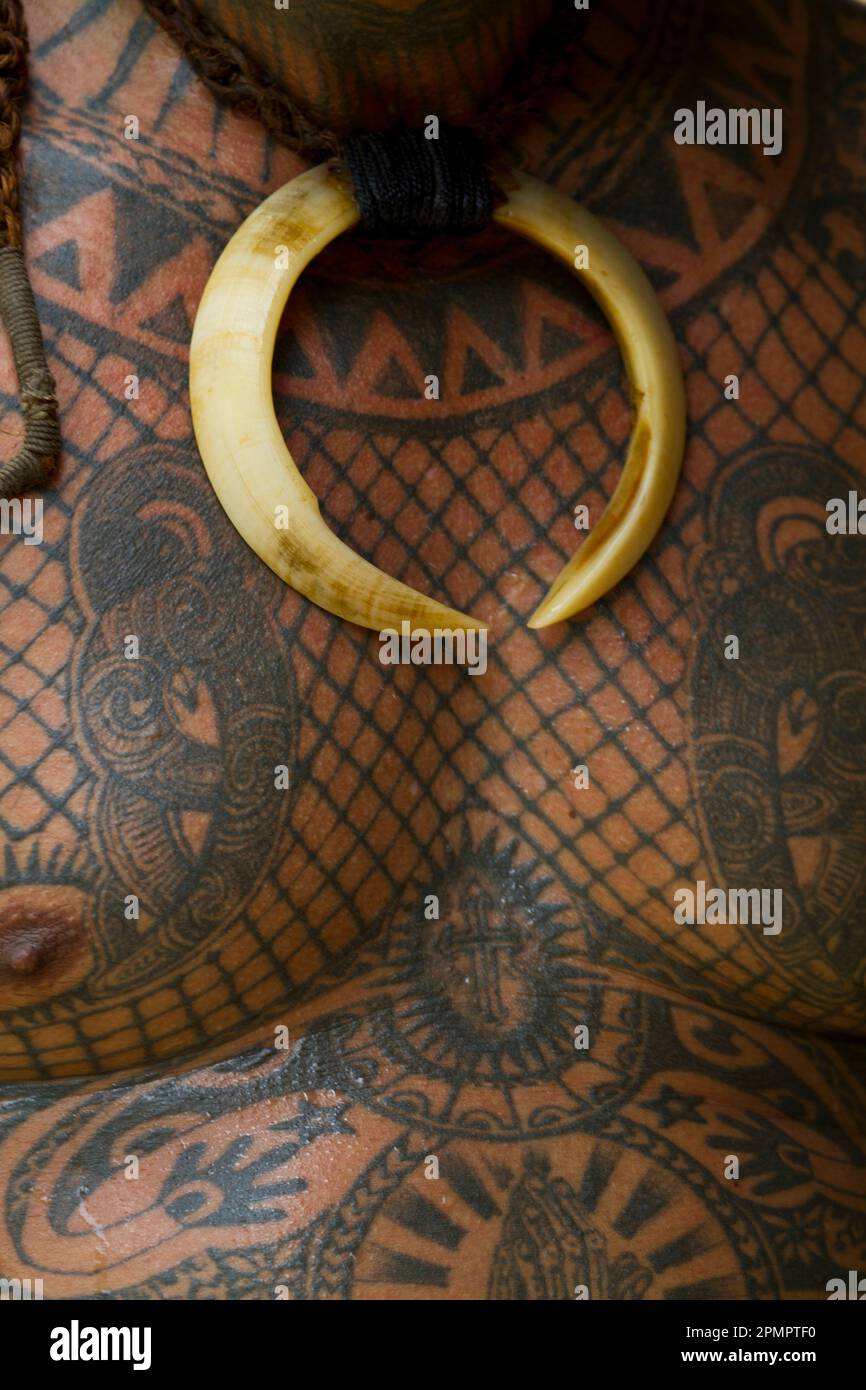 Body tattoo and a tusk necklace on a Samoan man's chest; Samoa Stock ...