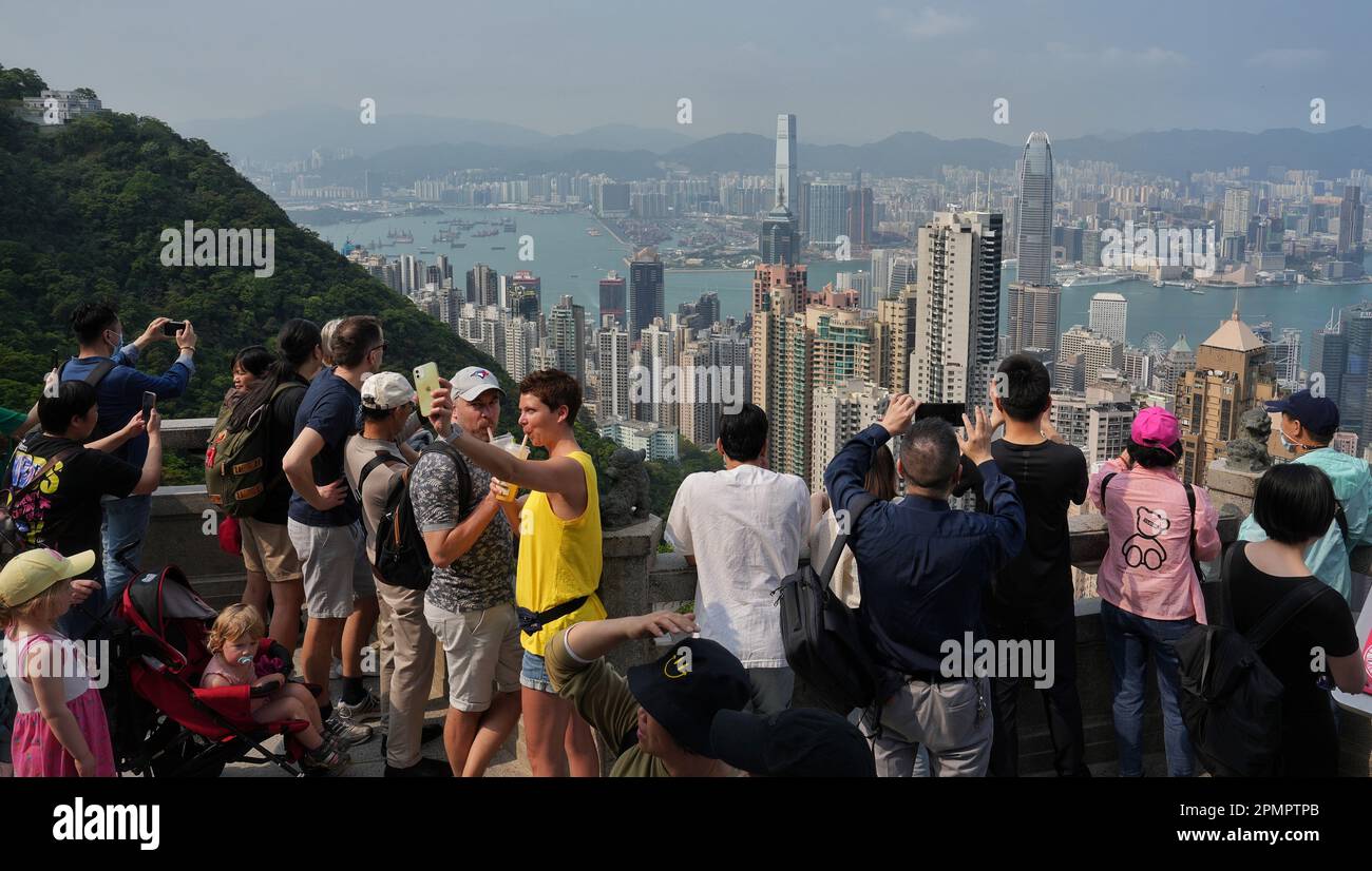 The peak is crowded with tourists under a shiny weather. 12APR23 SCMP ...