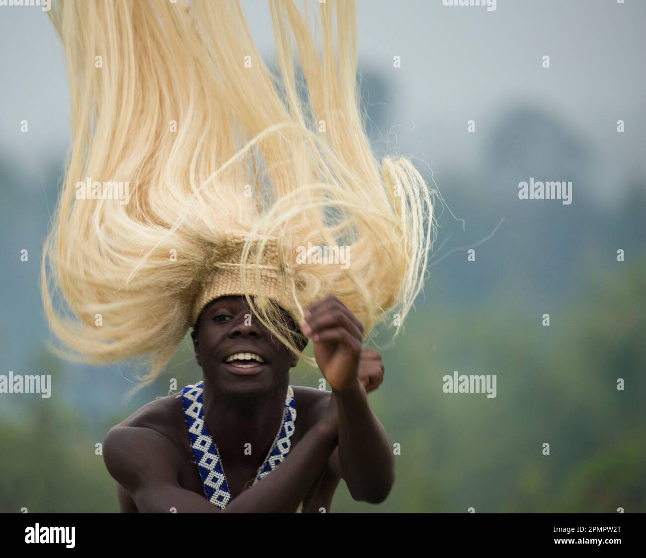 Traditional Rwandan dancer at a local resort in Volcanoes National Park ...
