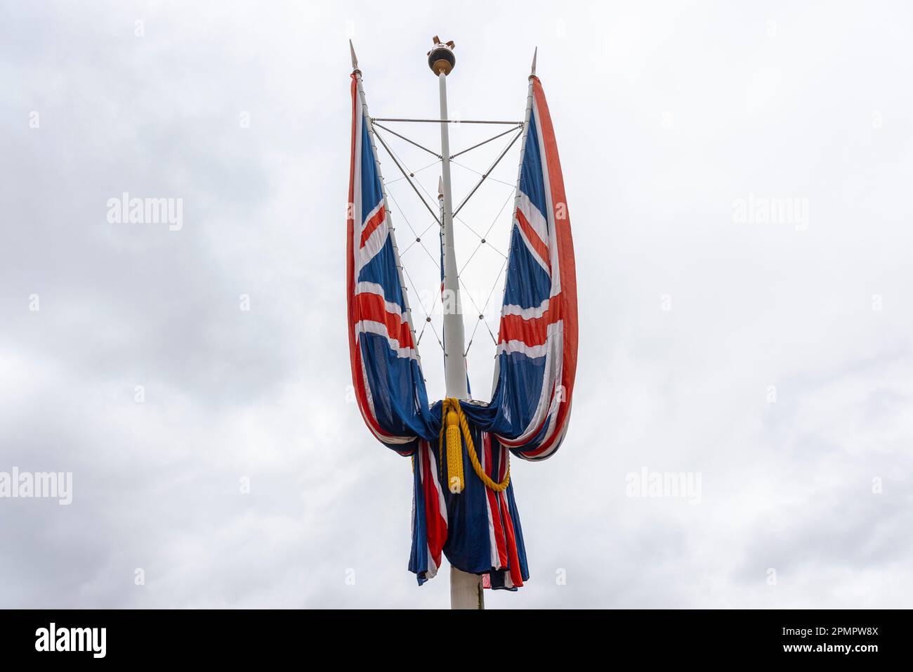 London, UK - 14 April 2023- Union flags have been placed outside ...