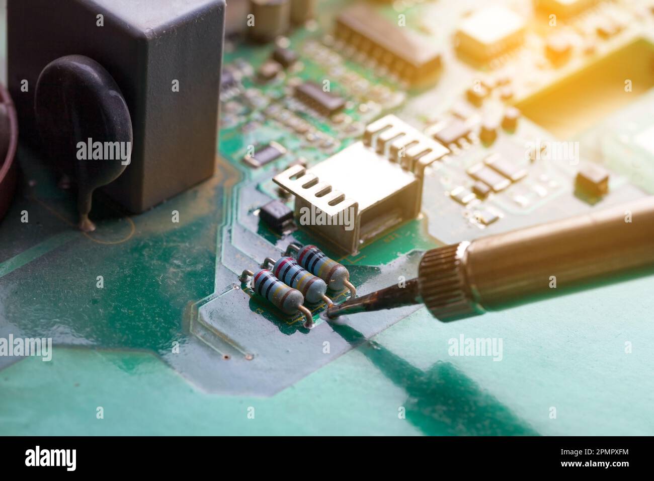 Soldering iron. Repairing electronic component. Microelectronics ...