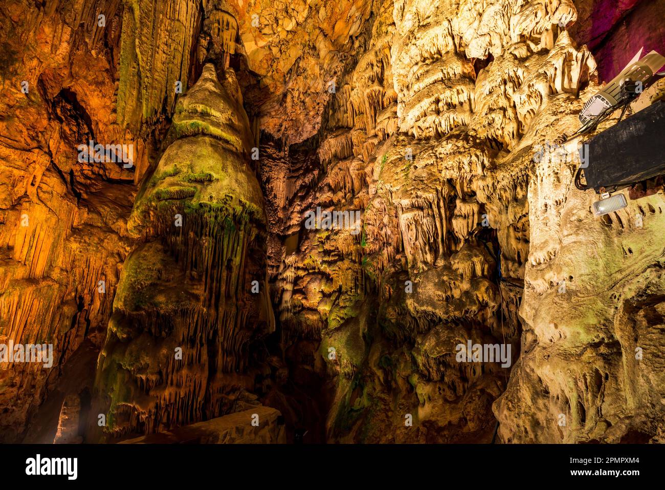 Illuminated natural underground rock formations inside St. Michaels ...