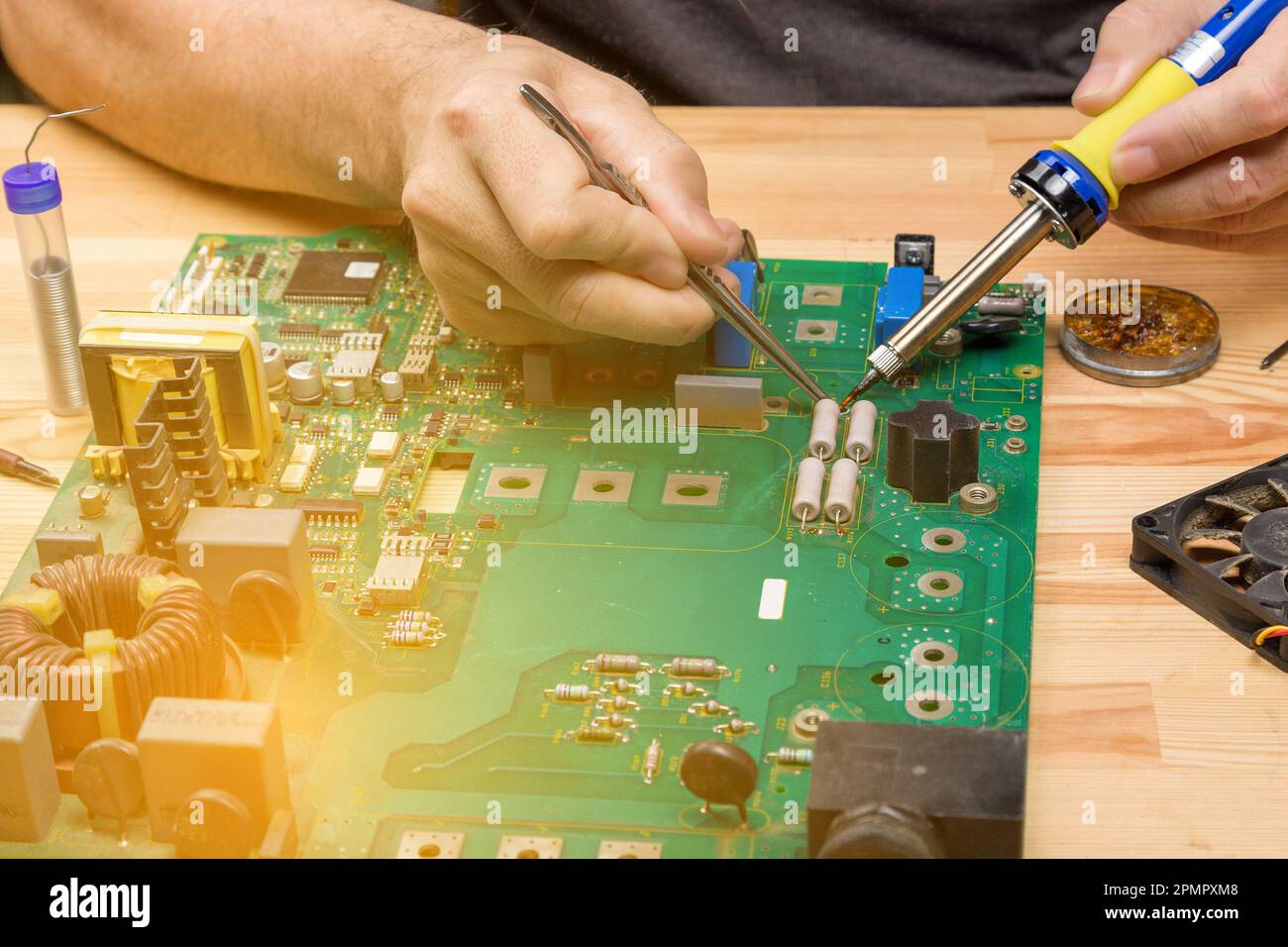 Soldering iron. Repairing electronic component. Microelectronics ...