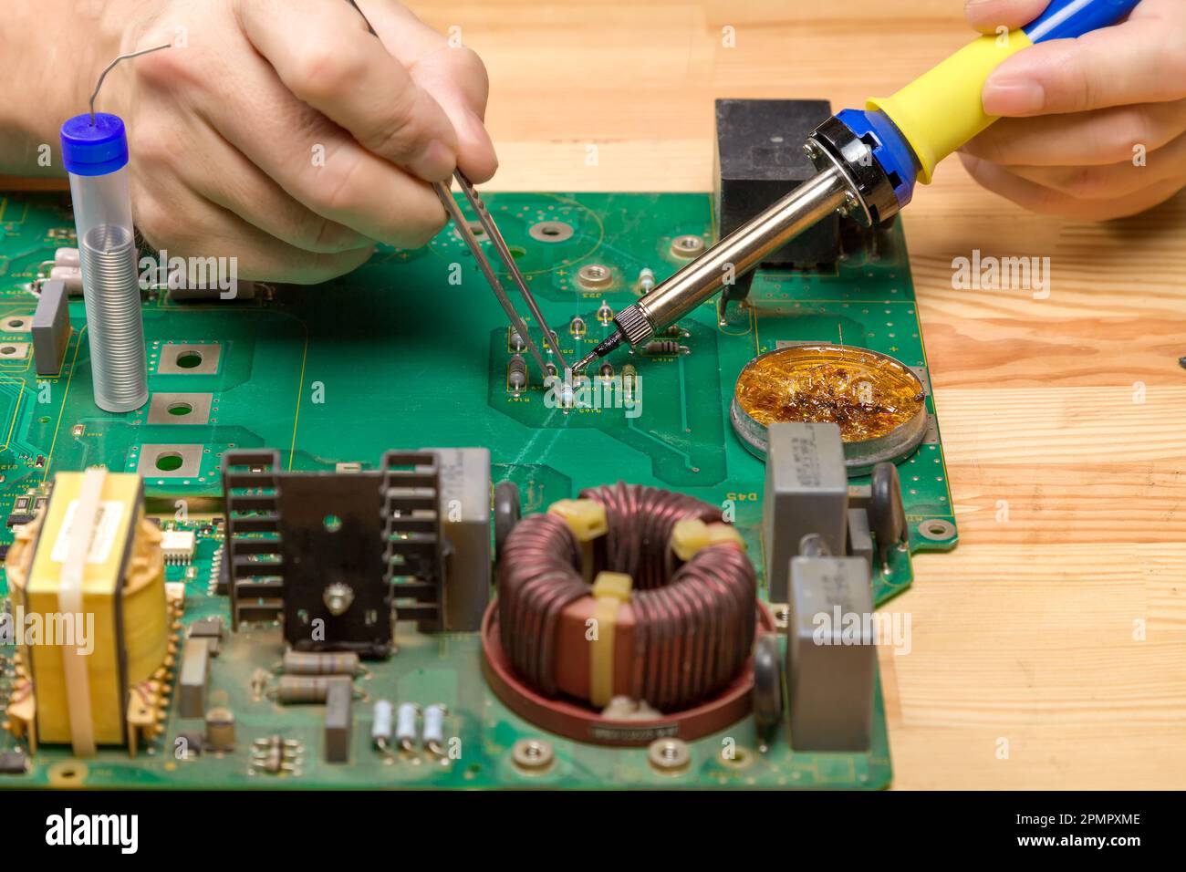 Soldering iron. Repairing electronic component. Microelectronics ...