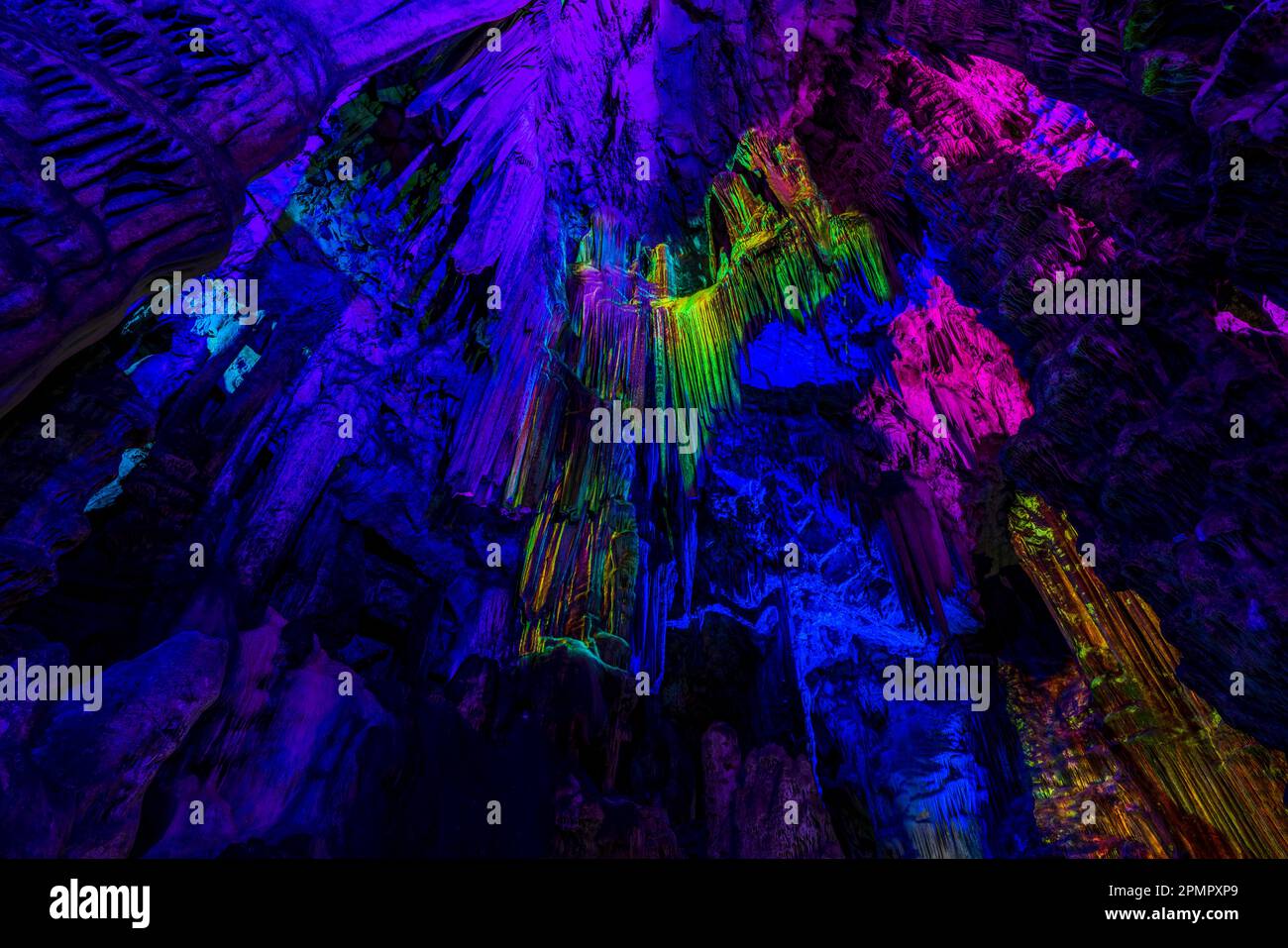 Illuminated natural underground rock formations inside St. Michaels ...