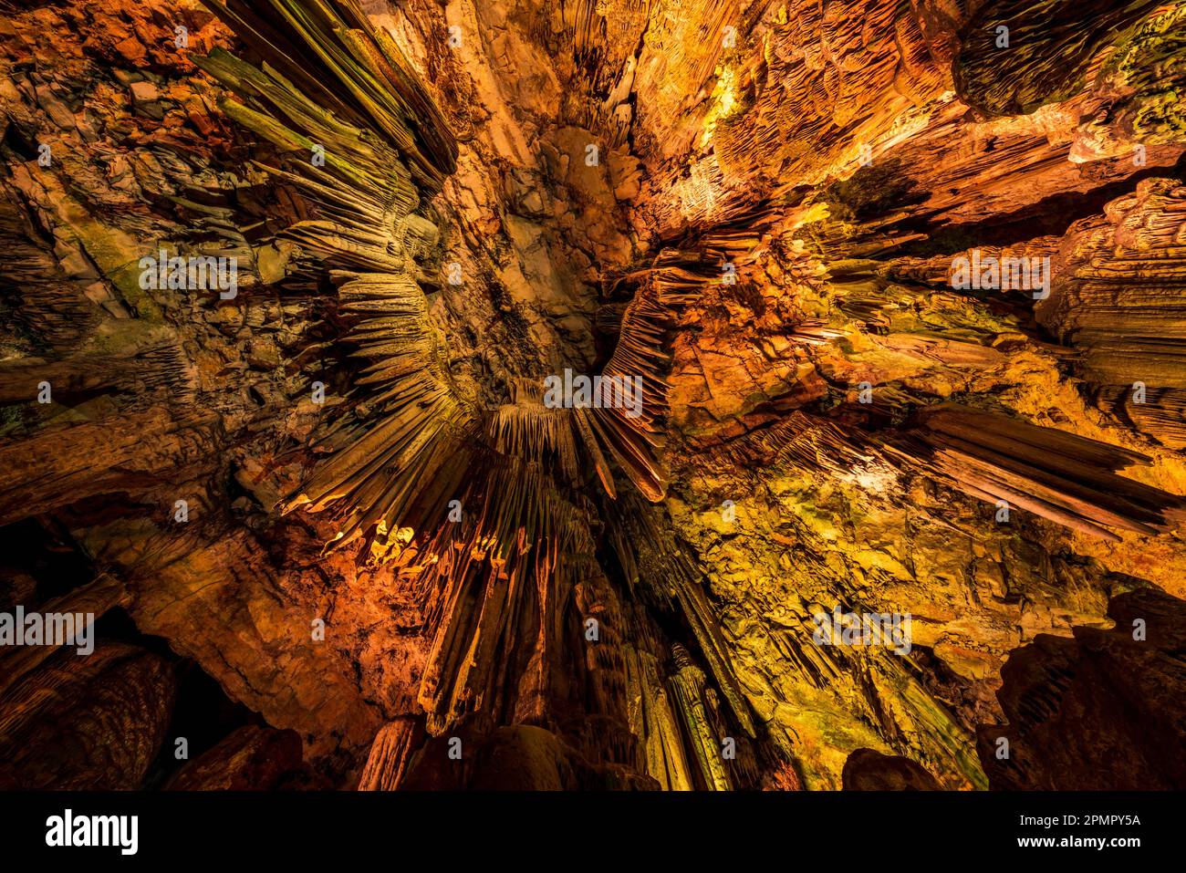 Illuminated natural underground rock formations inside St. Michaels ...