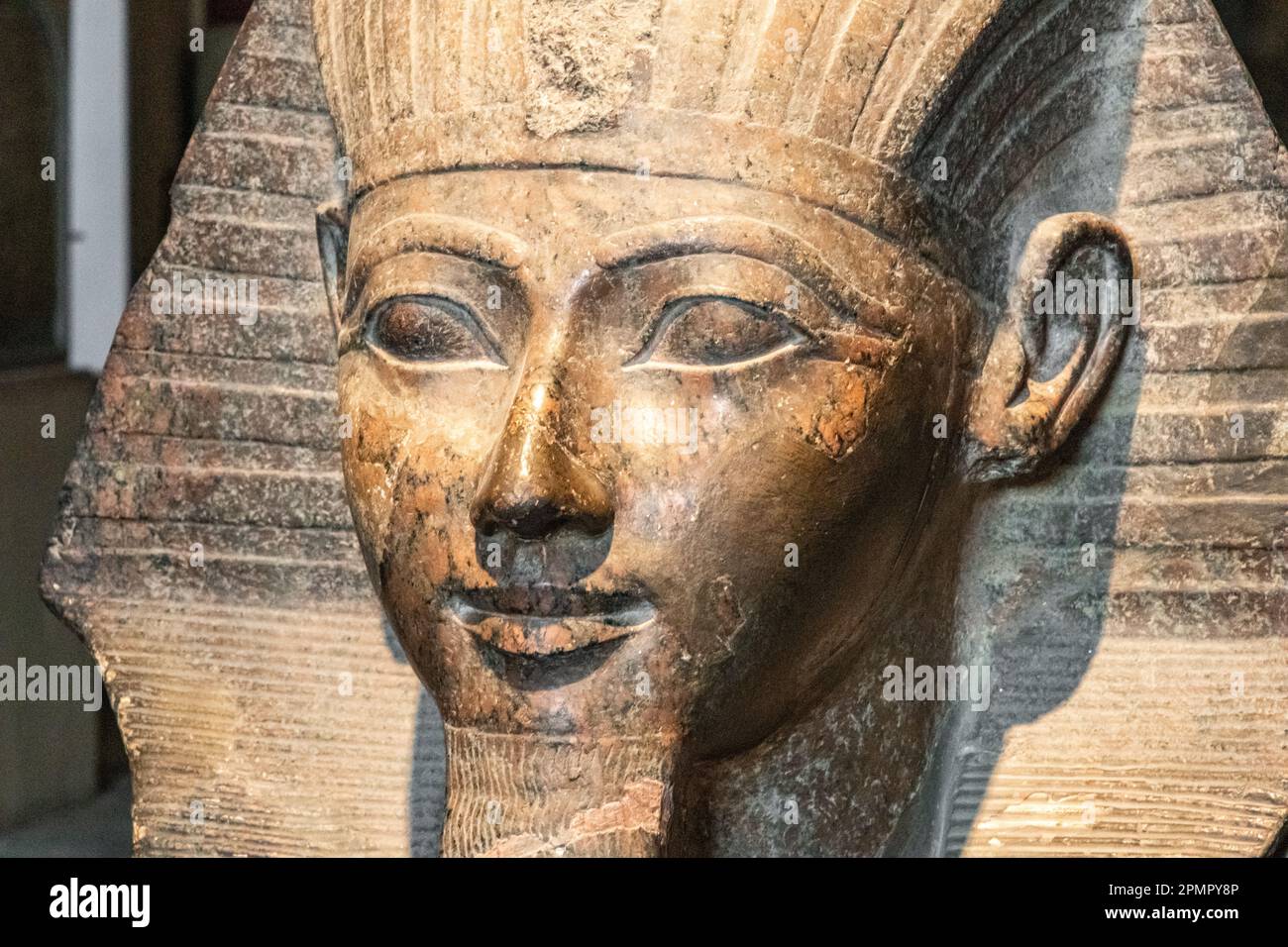 The face of a pharaoh on a statue sculpture at the Museum of Egyptian ...