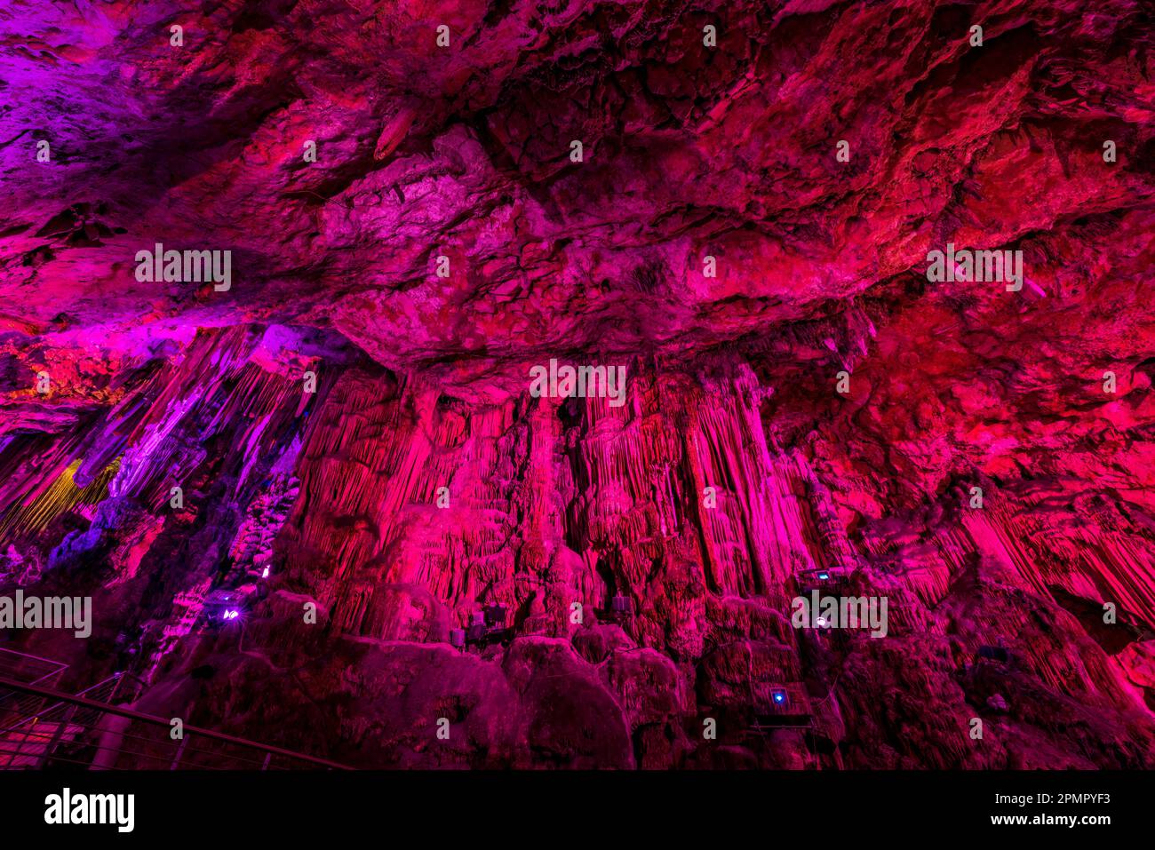 Illuminated natural underground rock formations inside St. Michaels ...