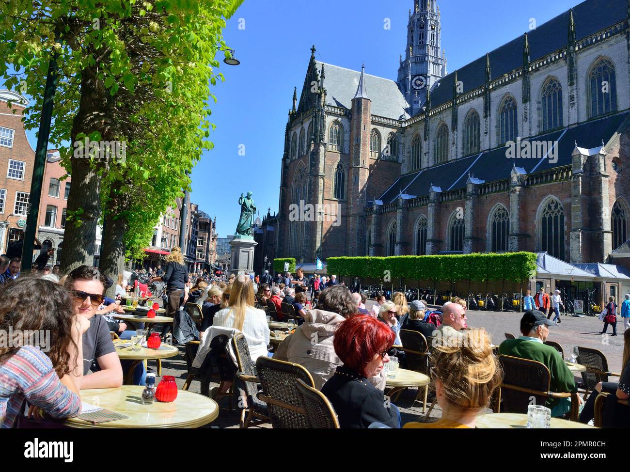 People enjoying the spring sunshine in the outside eateries around the ...