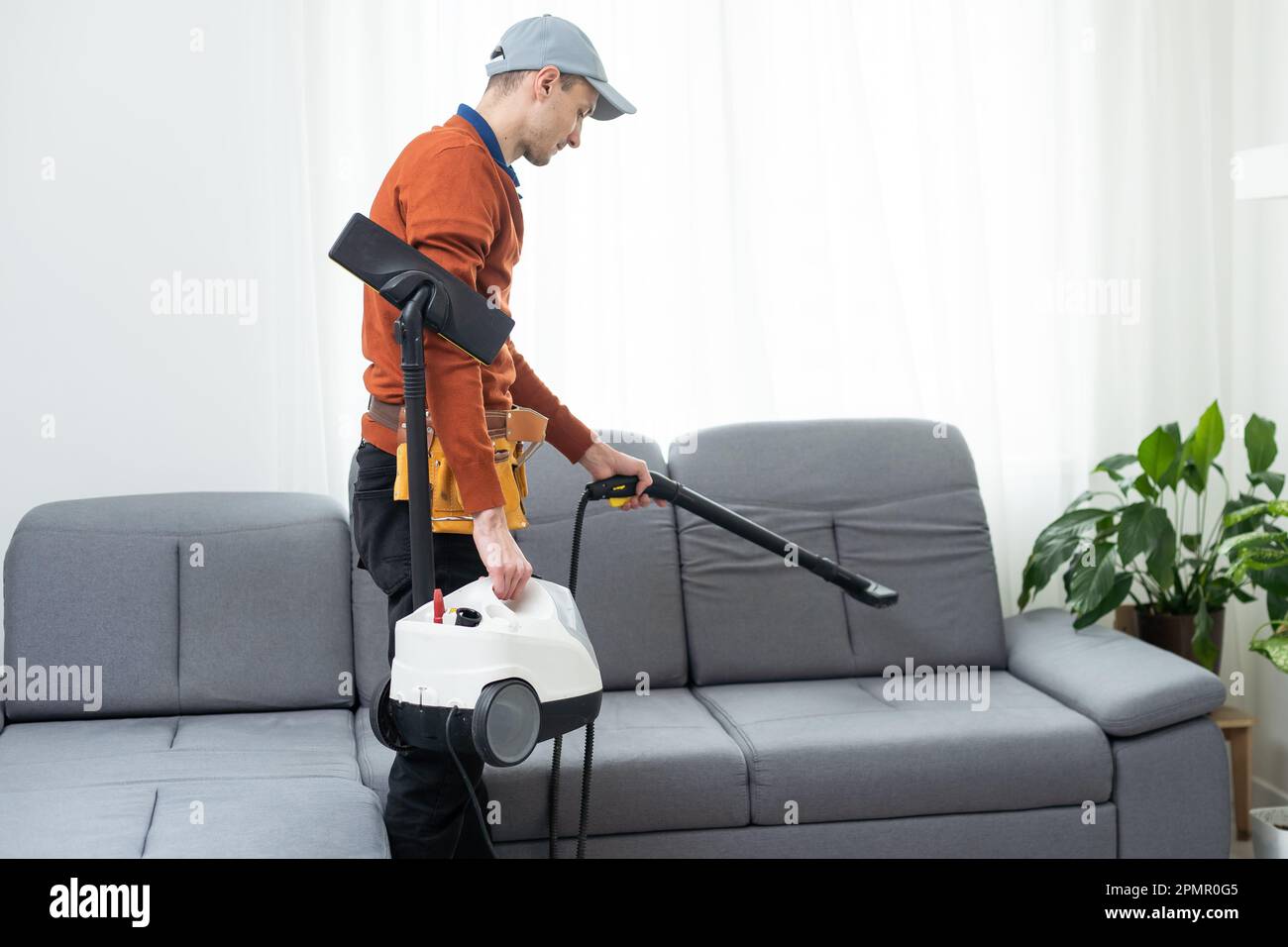 Process of deep furniture cleaning, removing dirt from sofa. Washing ...