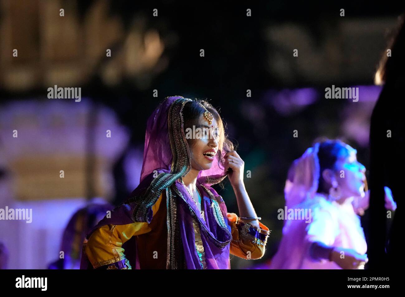 Artists perform traditional dance at a Mubarak Mandi Heritage Complex ...