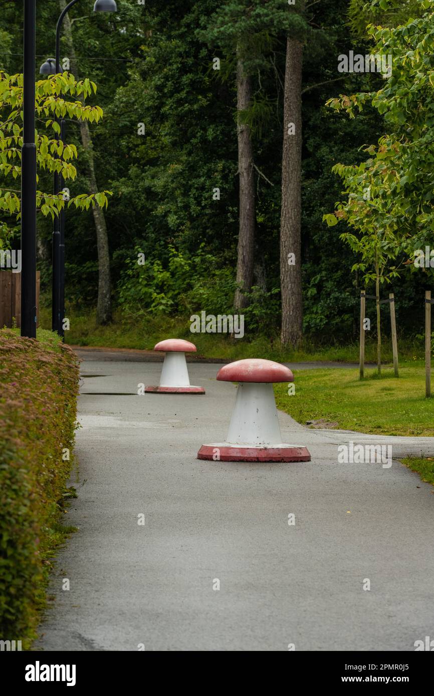 Concrete -road blocks formed to look like mushrooms Stock Photo - Alamy