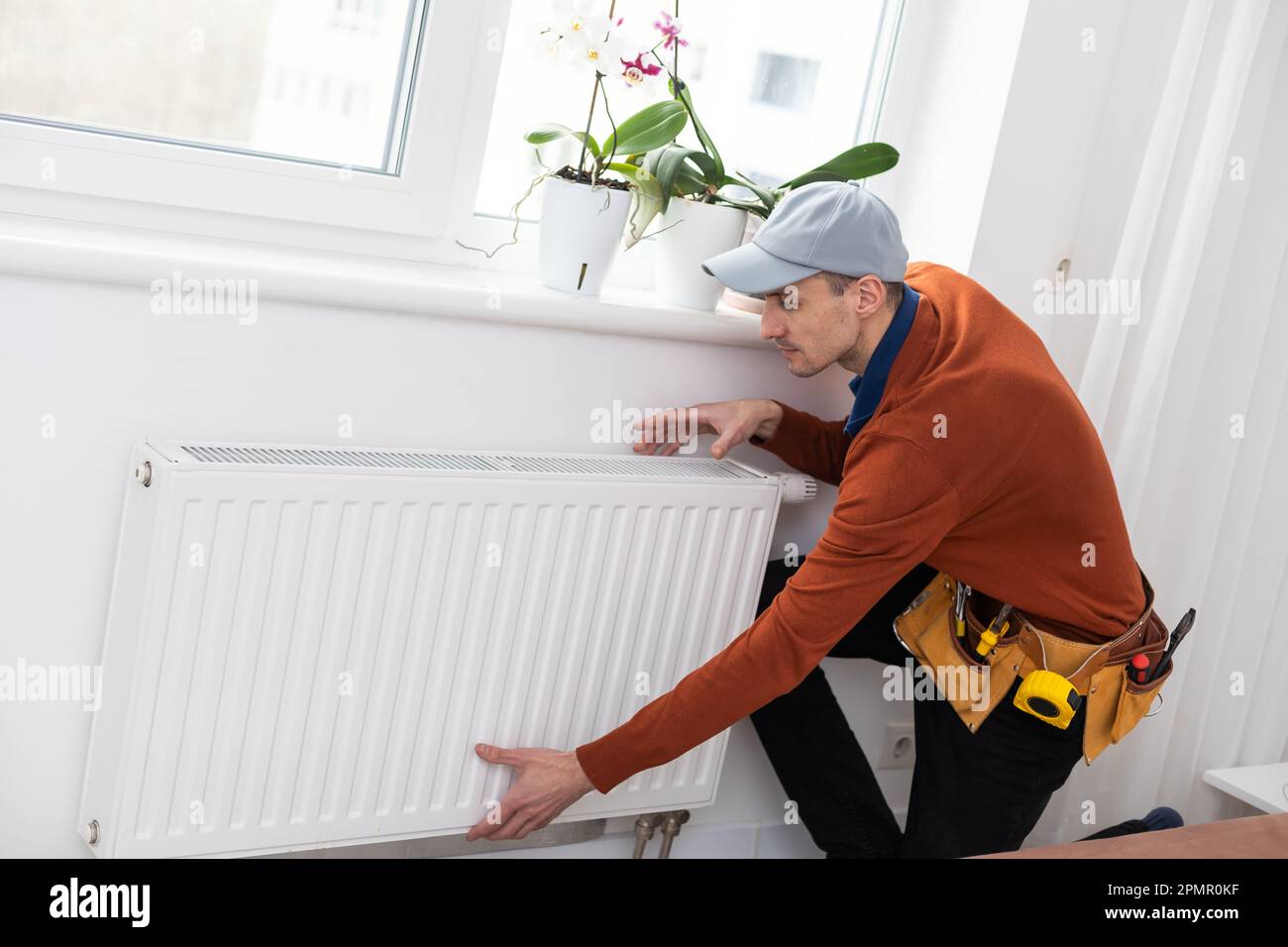 adjustment of heating radiator. temperature Stock Photo - Alamy