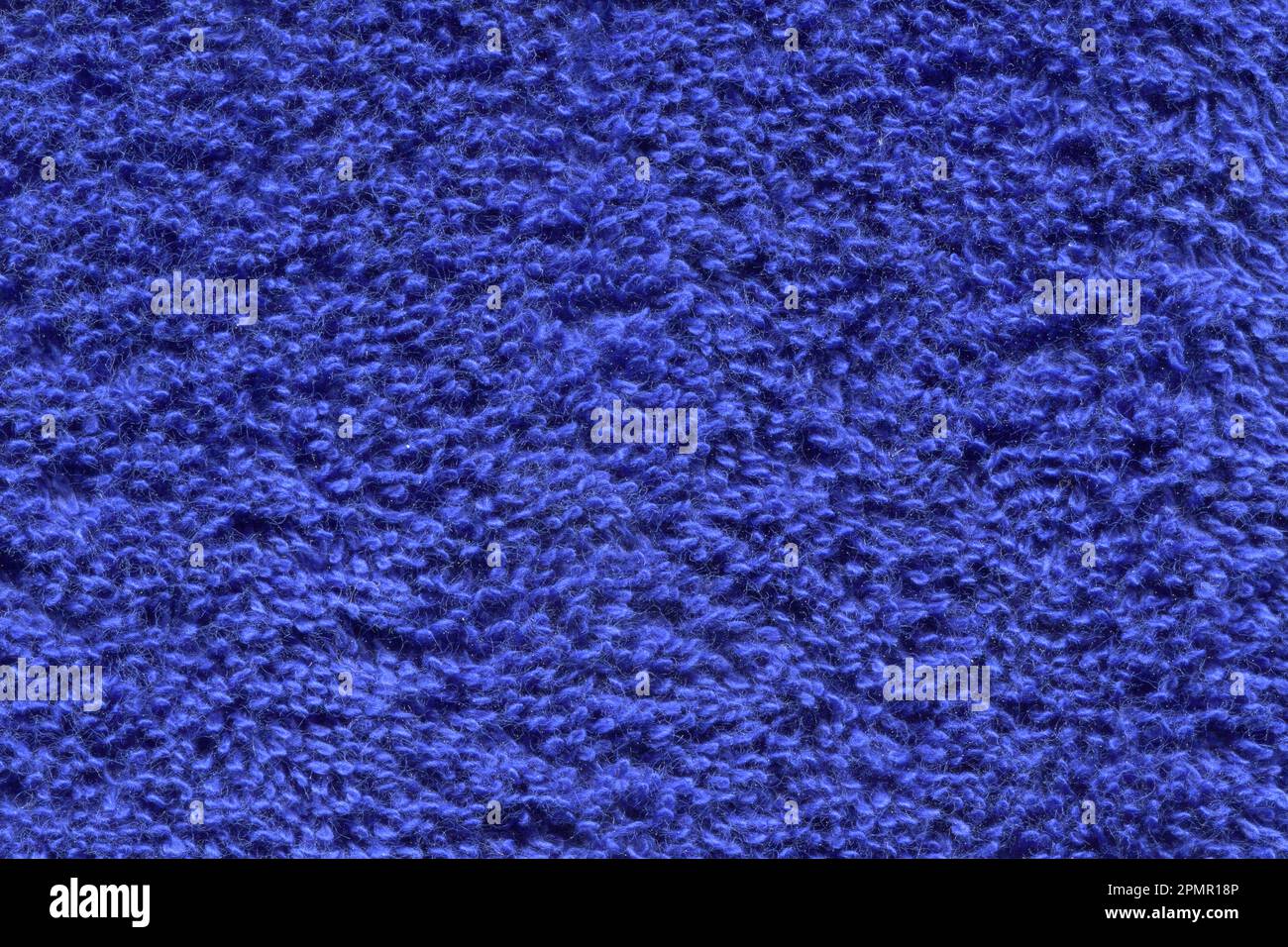 texture of blue terry cloth fabric. close up of a towel terry cloth ...
