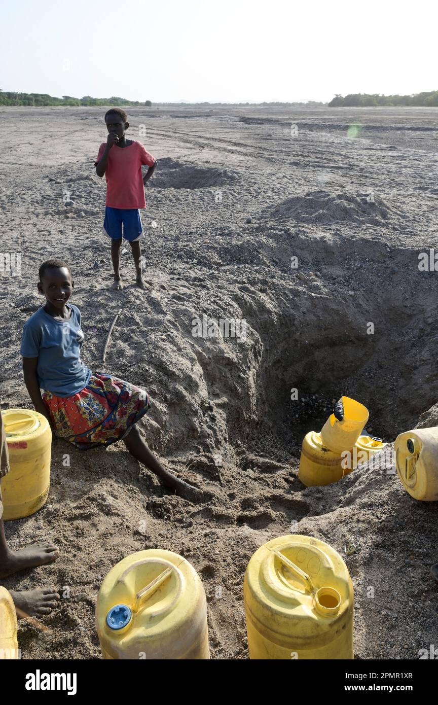 KENYA, Turkana, drought, dry river bed, people fetch water from digged ...