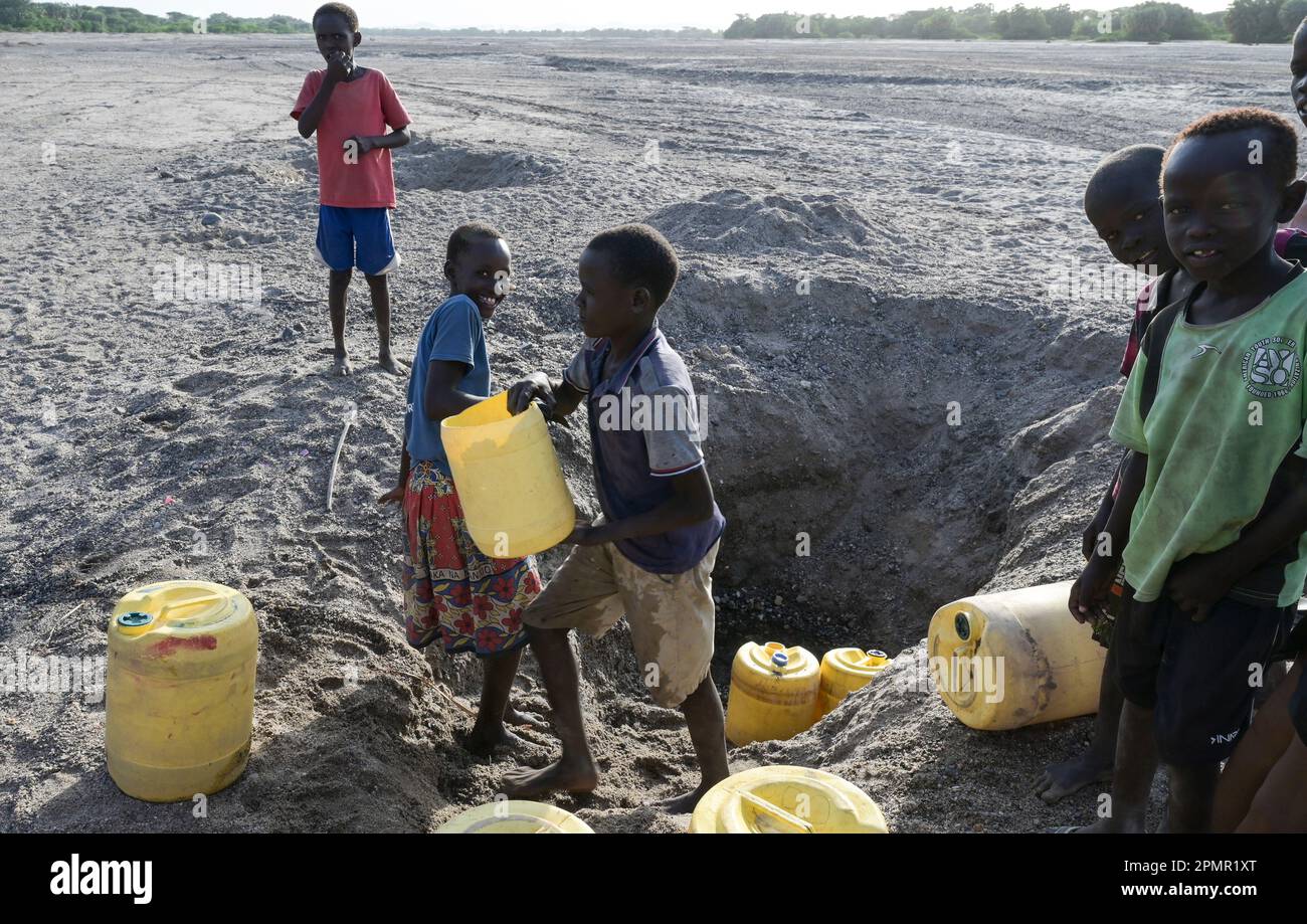 KENYA, Turkana, drought, dry river bed, people fetch water from digged ...
