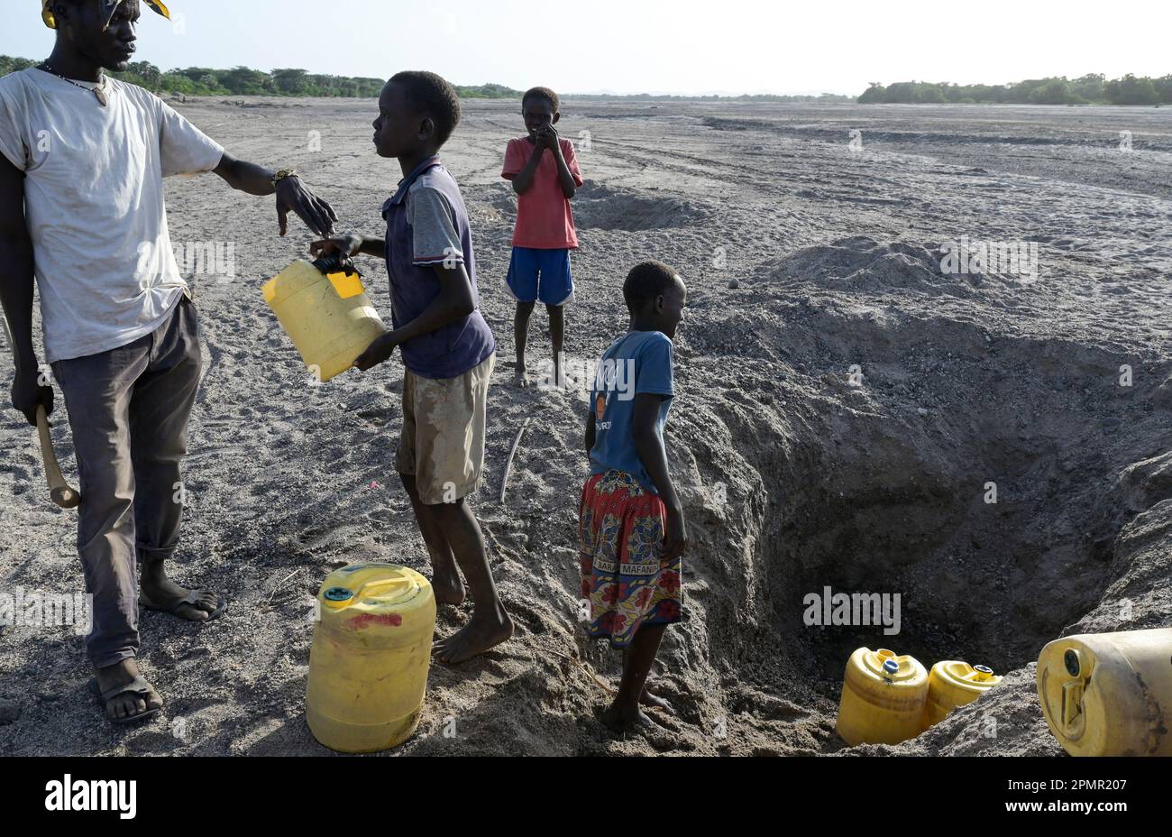 KENYA, Turkana, drought, dry river bed, people fetch water from digged ...