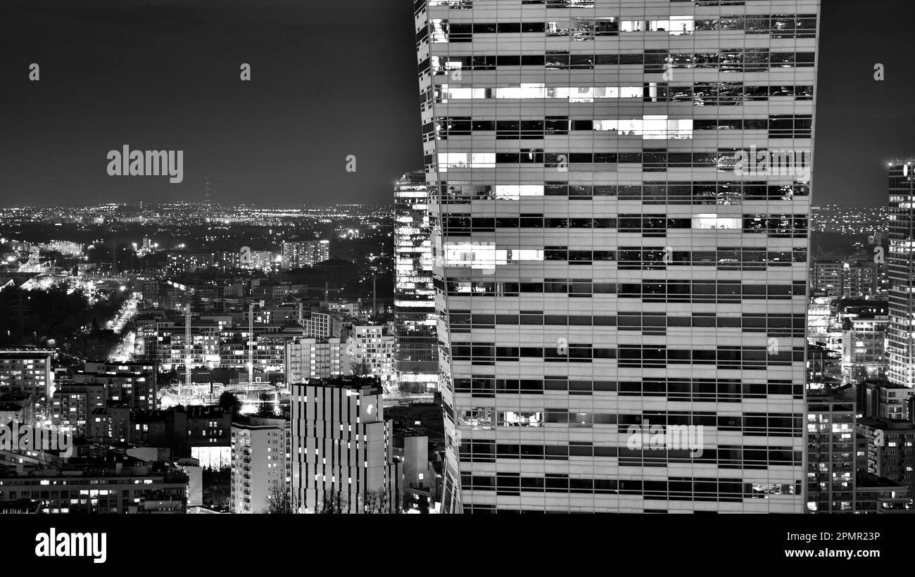 View of at night glass buildings and modern business skyscrapers,. View ...