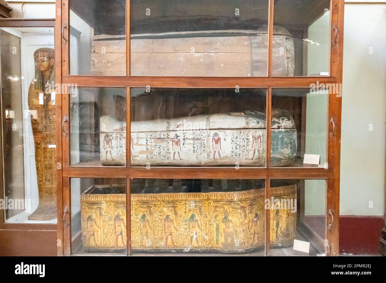 A display showing a collection of coffins and sarcophagi at the Museum ...