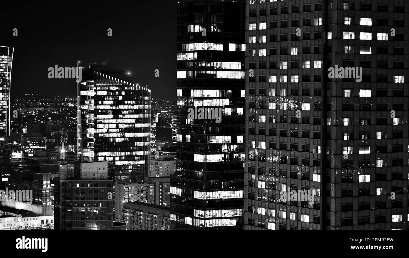 View of at night glass buildings and modern business skyscrapers,. View ...