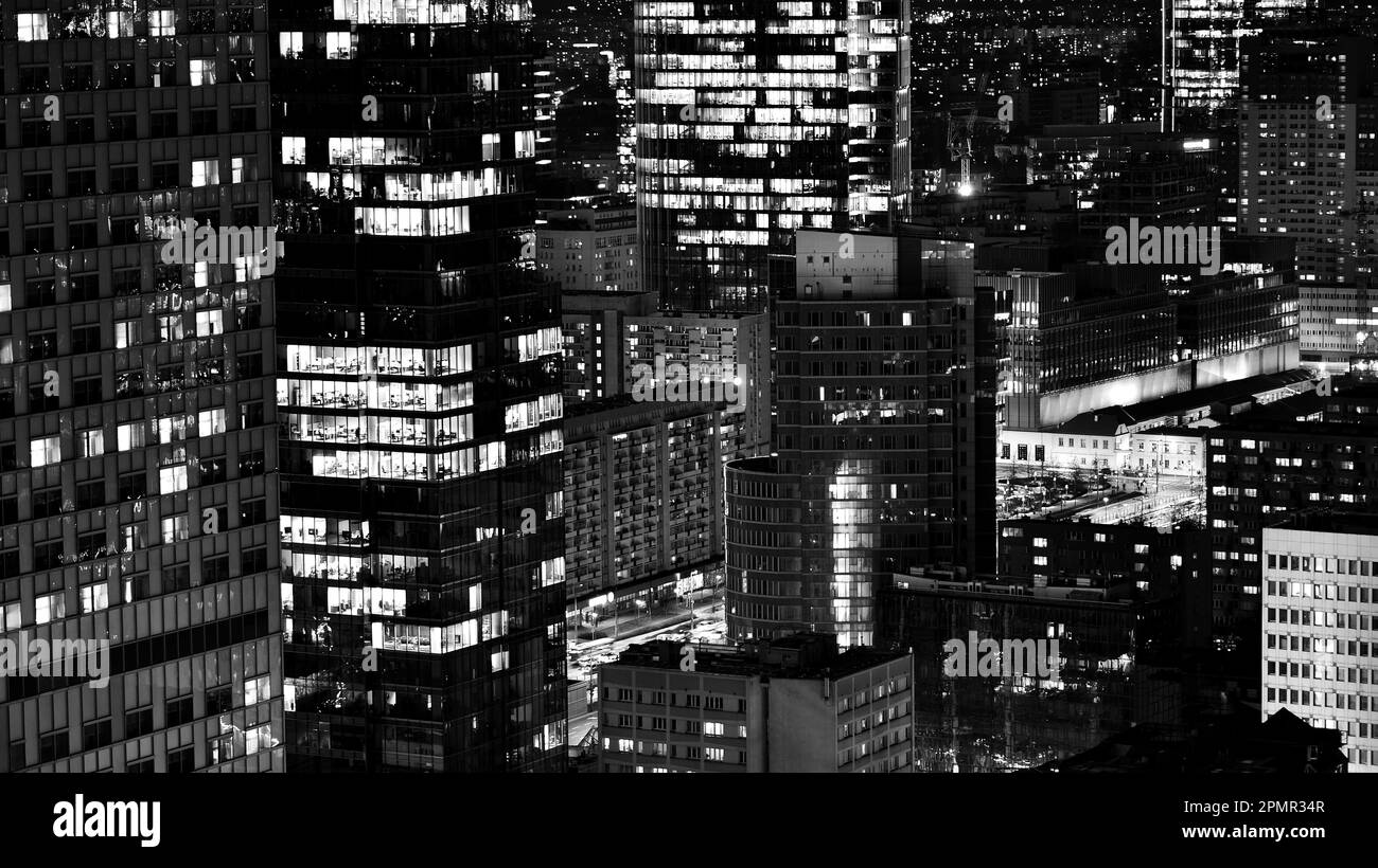 View of at night glass buildings and modern business skyscrapers,. View ...