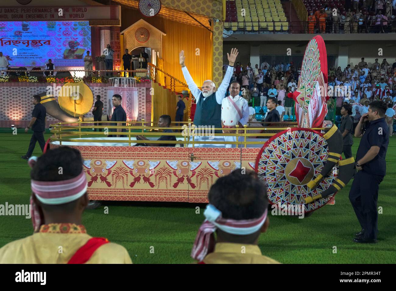 Indian Prime Minister Narendra Modi, wave towards the waiting Assamese ...