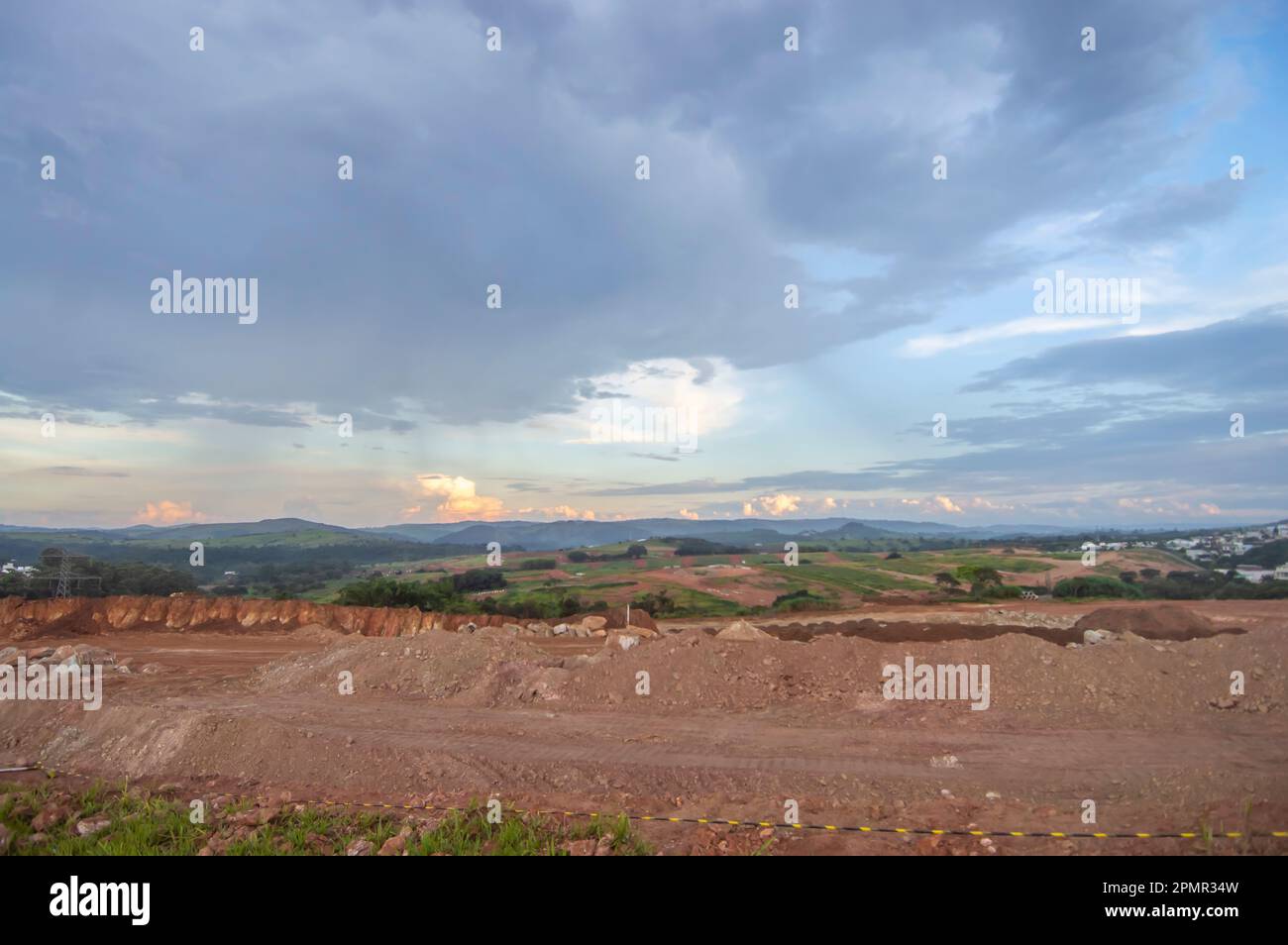 Landscape with in transition, from green area to start construction to ...