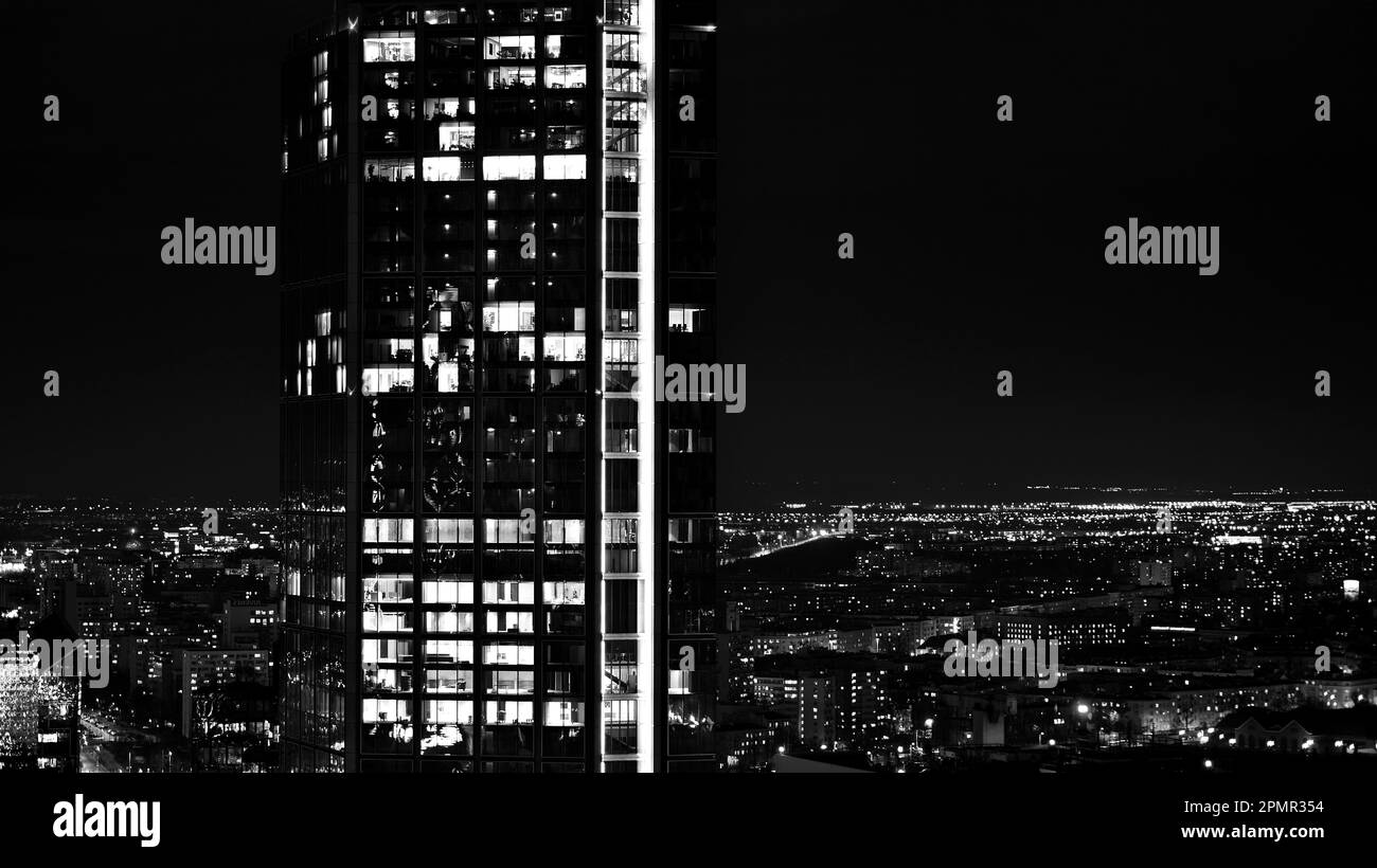 View of at night glass buildings and modern business skyscrapers,. View ...