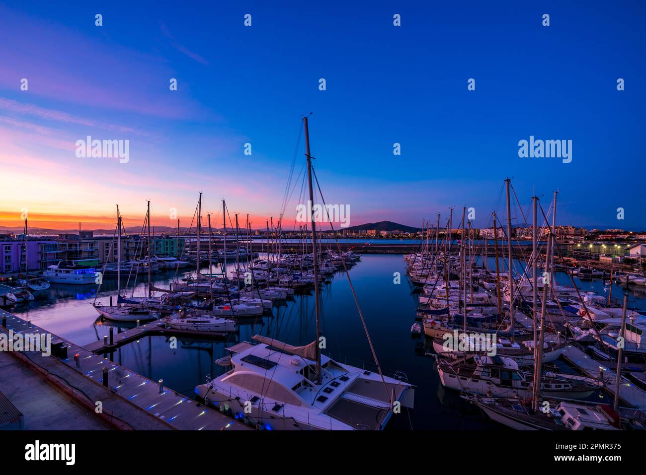 Colorful sunset over the Marina Bay in Gibraltar, a British Overseas ...