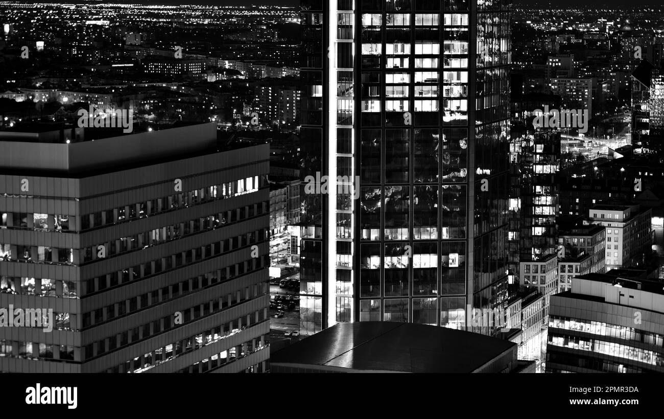 View of at night glass buildings and modern business skyscrapers,. View ...